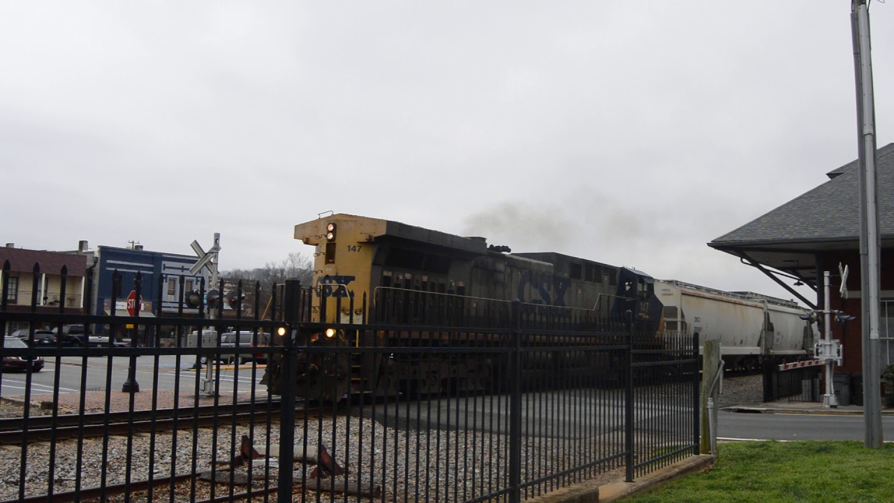 CSX 147 leads a northbound local long hood forward through Cartersville ...