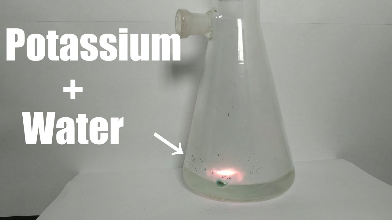 Potassium reacting with water - YouTube