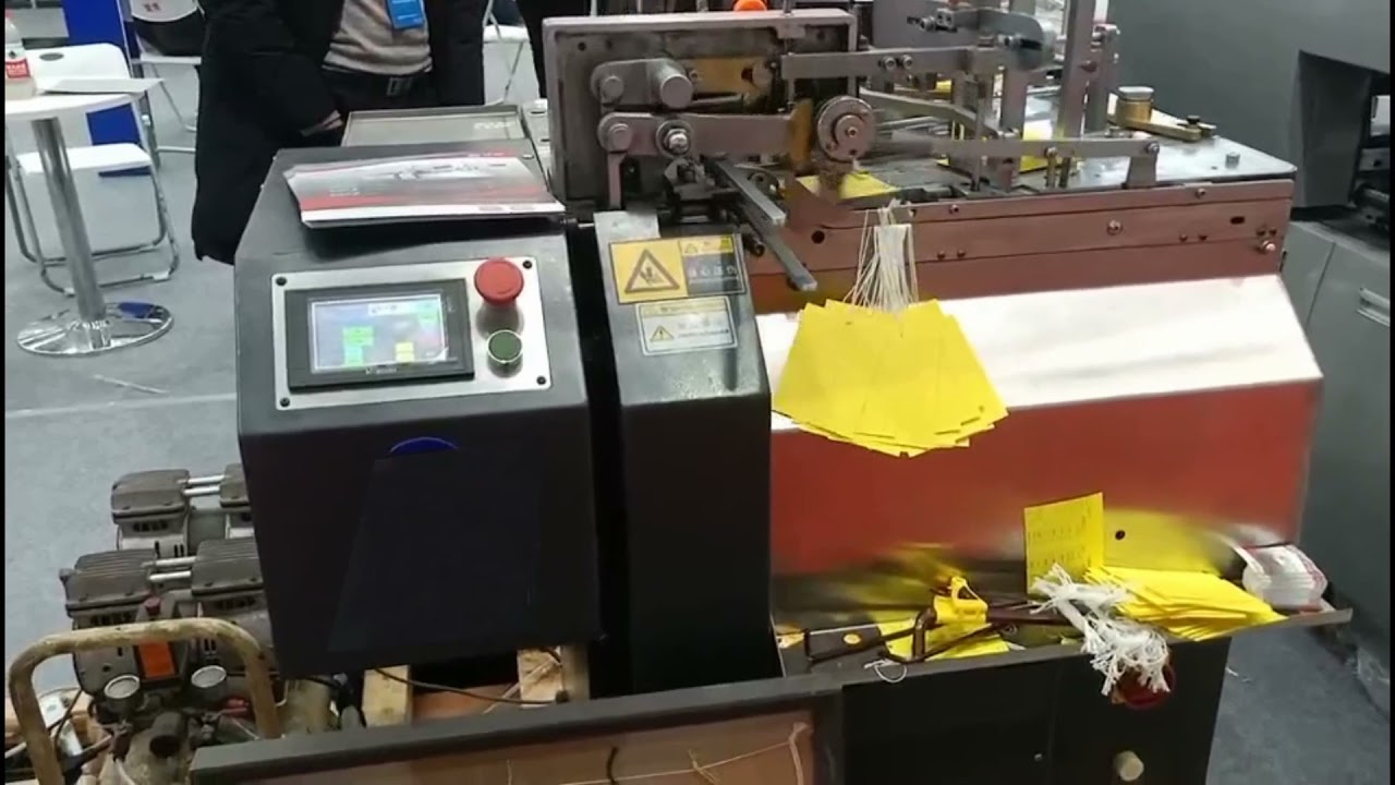 Automatic Hangtag Threading and knotting machines - YouTube