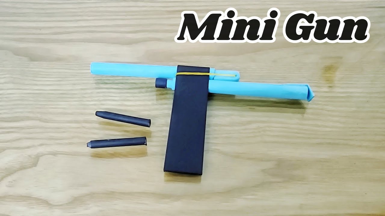 HOW TO MAKE A MINI GUN THAT SHOOTS PAPER BULLETS - YouTube
