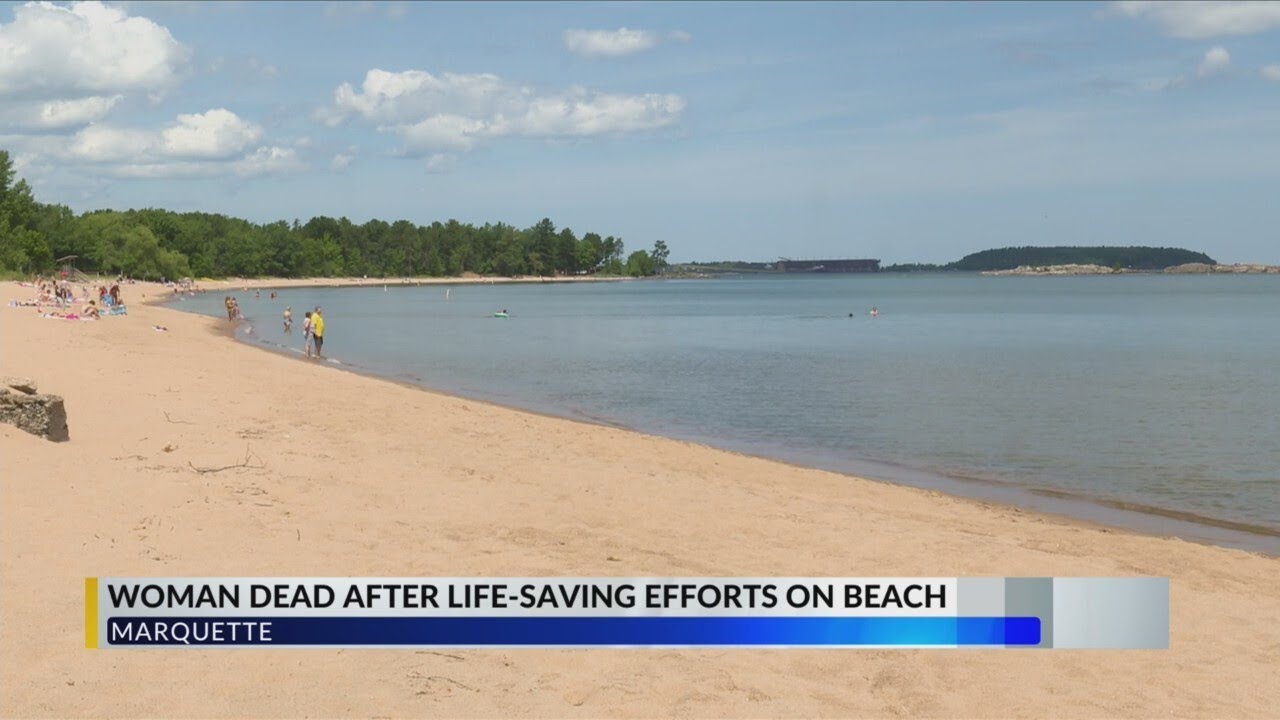 Woman dead after life-saving efforts on beach at McCarty’s Cove - YouTube
