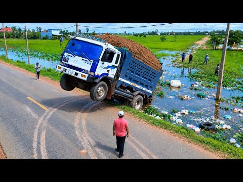 DUMP TRUCK VS FLOODED ROAD! Extreme Road Repair: Stopping the Water Before it Washes Away