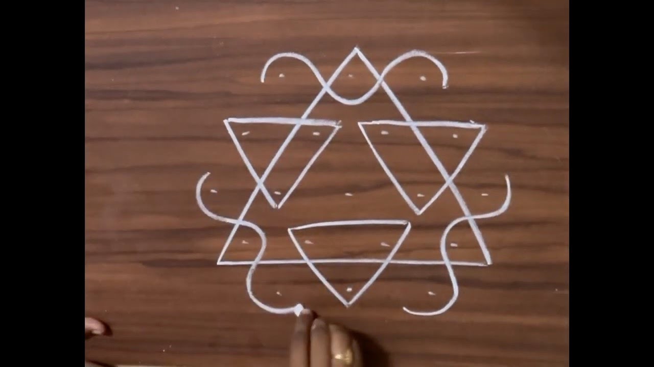 simple rangoli with triangles - YouTube