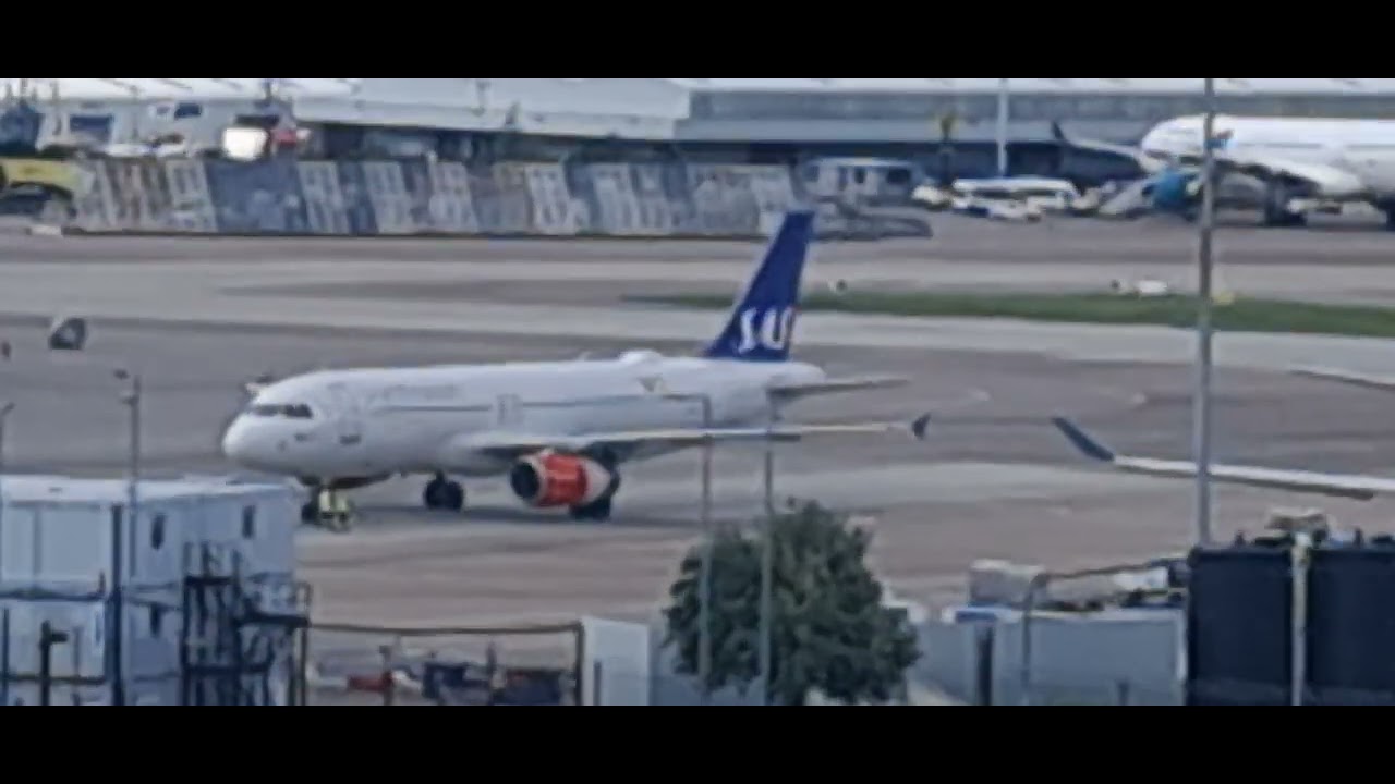 SCANDINAVIAN AIRBUS A320 on pushback and departure hotel view - YouTube