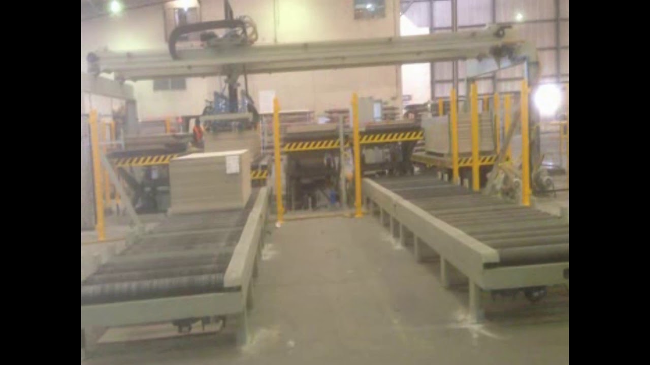 Automatic loading and unloading line of cement fiberboard - YouTube