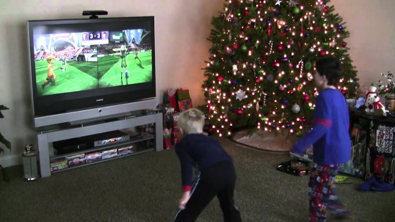 Kids playing Xbox Kinect Soccer - YouTube