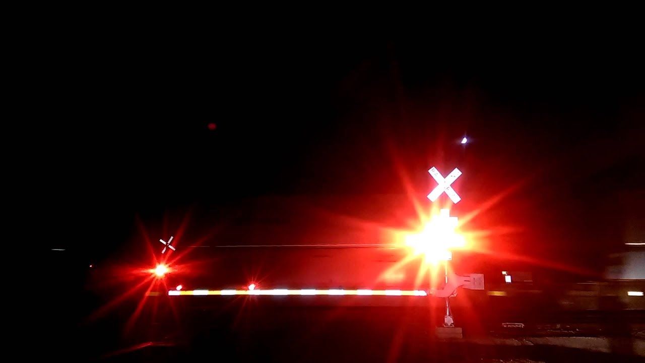 BNSF 7907 w/ a stack train W over 1st St in Oro Grande - YouTube