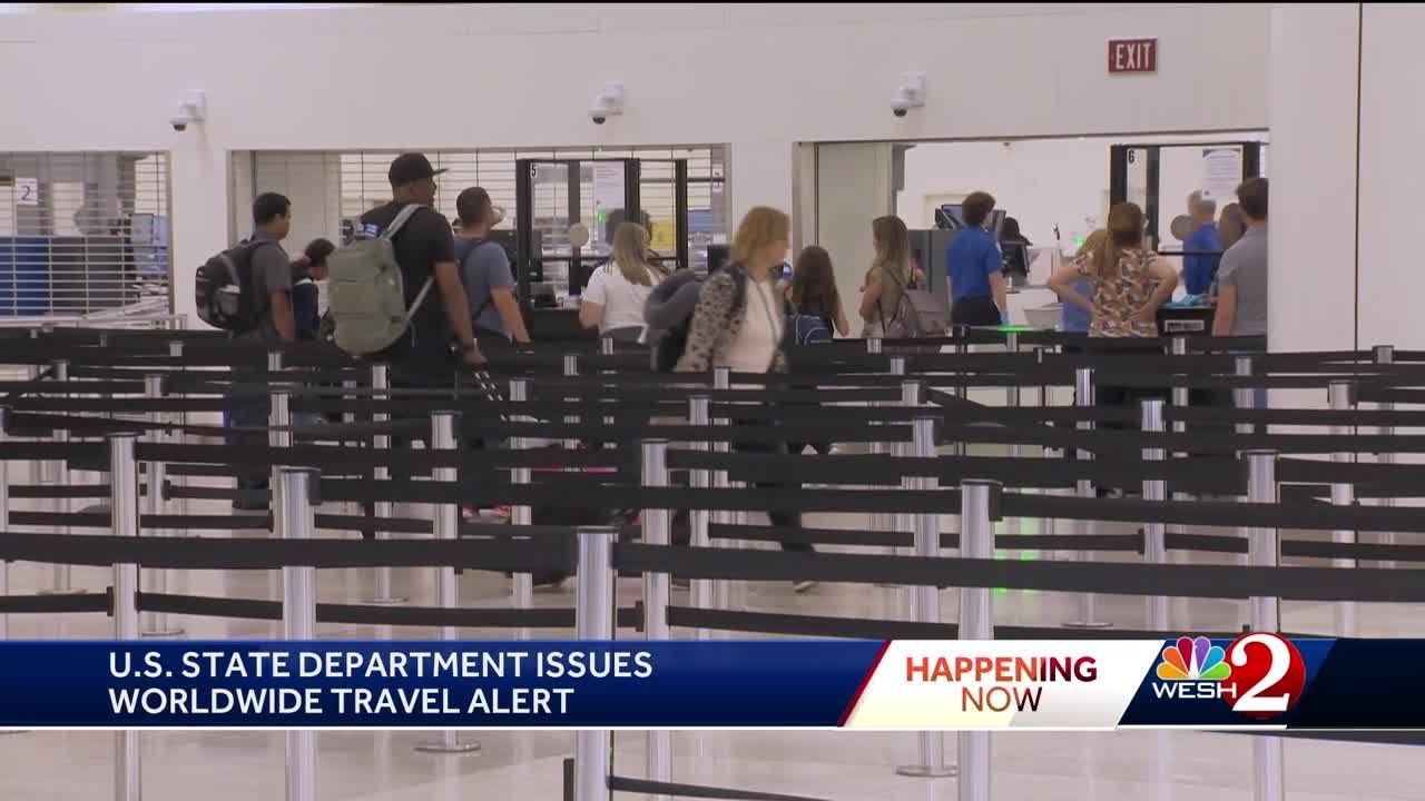 Orlando travelers stay diligent amid Department of State advisory - YouTube