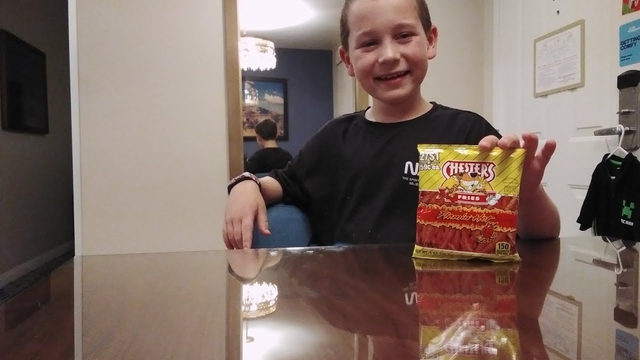 trying Chesters flaming hot fries for the first time - YouTube