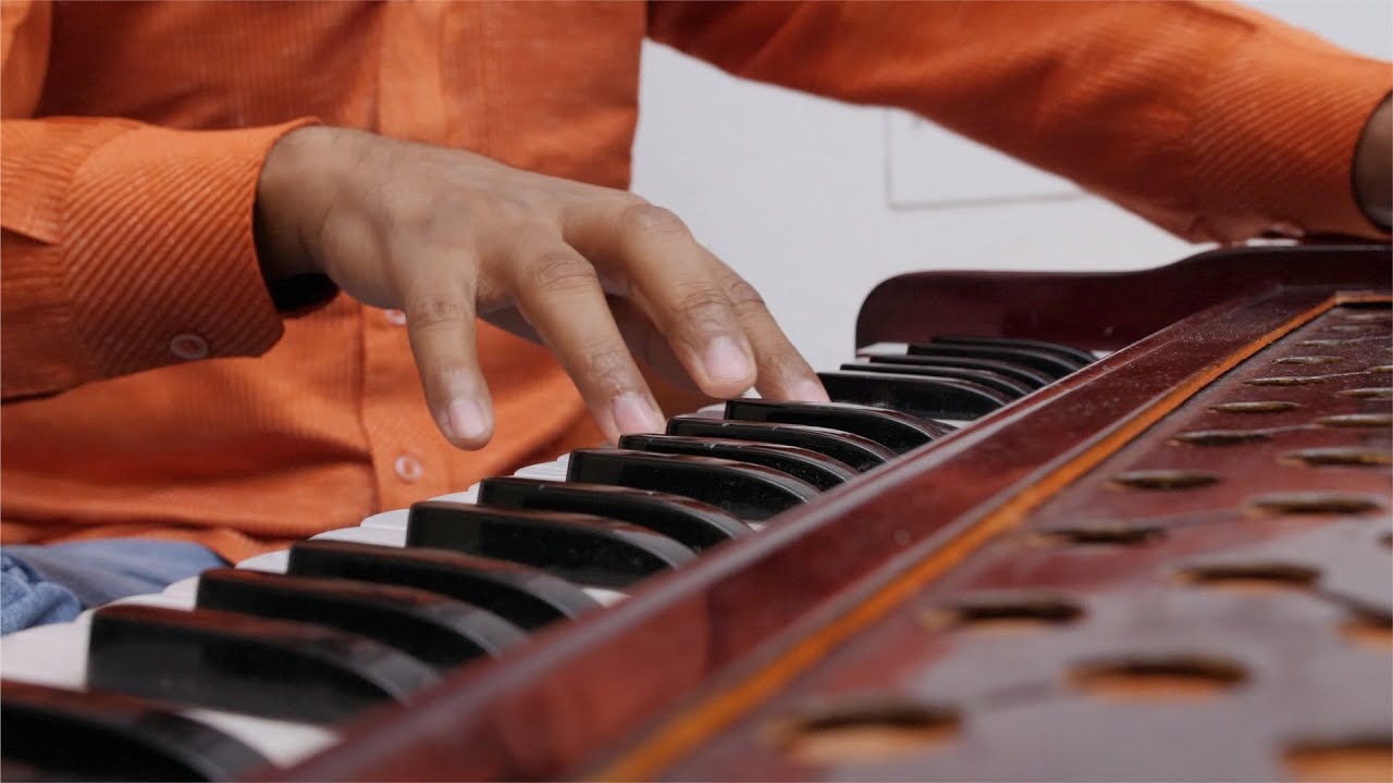 Playing Harmonium
