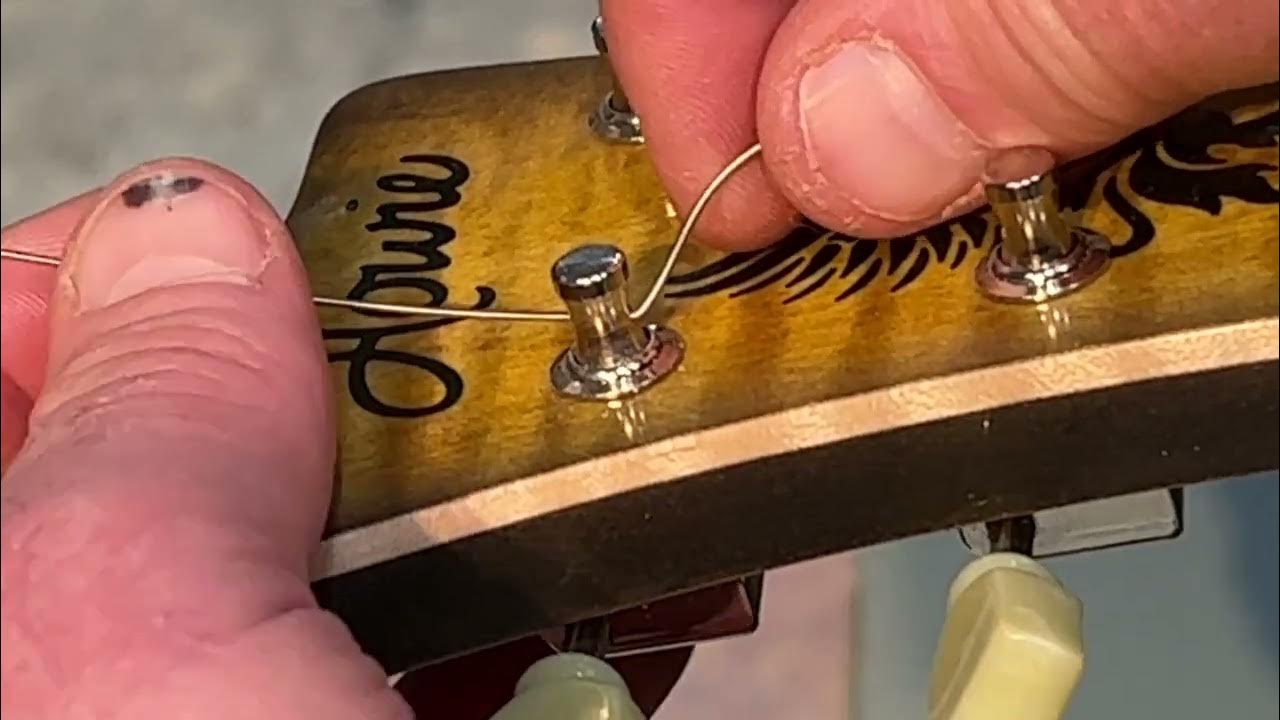 Put strings on your guitar like a pro. - YouTube
