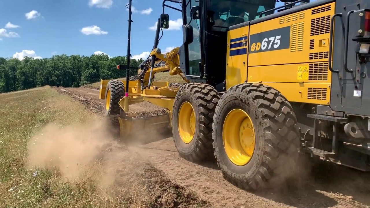 Topcon 3D MC2, installed on a Komatsu grader and a dozer . - YouTube