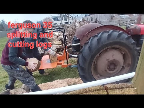 MF 35 splitting and cutting logs - YouTube