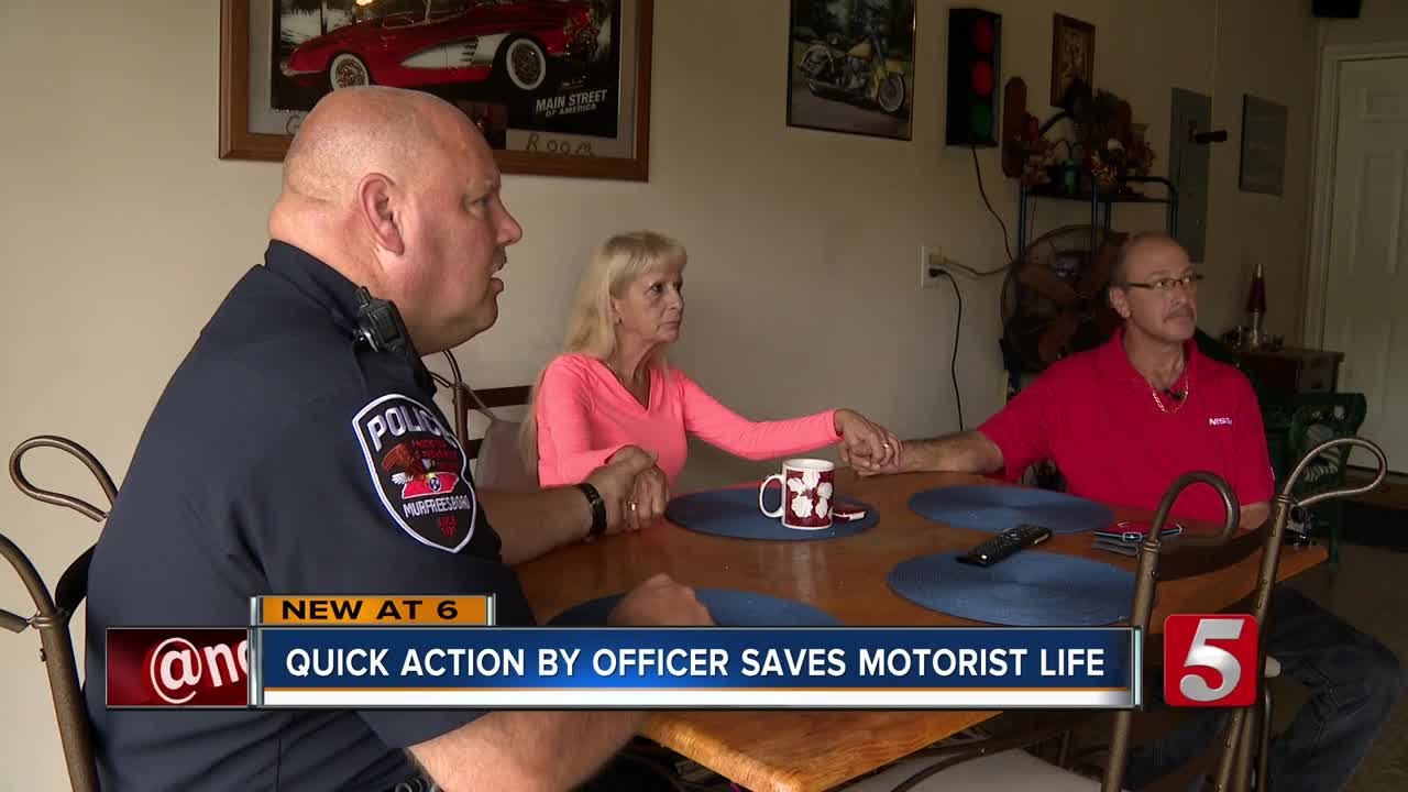 Police Officer Saves Man's Life After Crash - YouTube