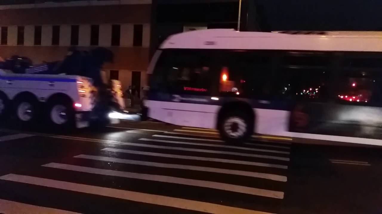 MTA Articulated Bus Being Towed On West 42nd Street In Manhattan, New ...