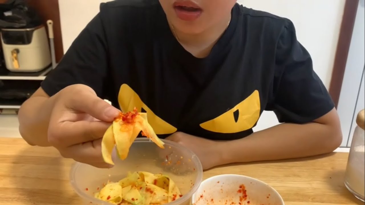 Eating mango with spicy salt. - YouTube