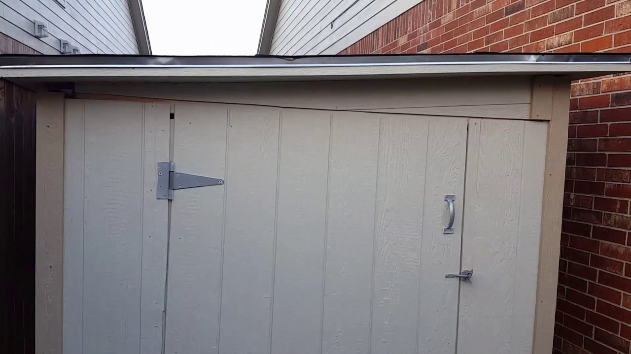 Shed with gas struts used to raise roof. - YouTube