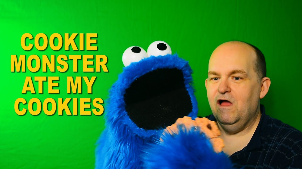 Cookie monster puppet eating cookies - YouTube