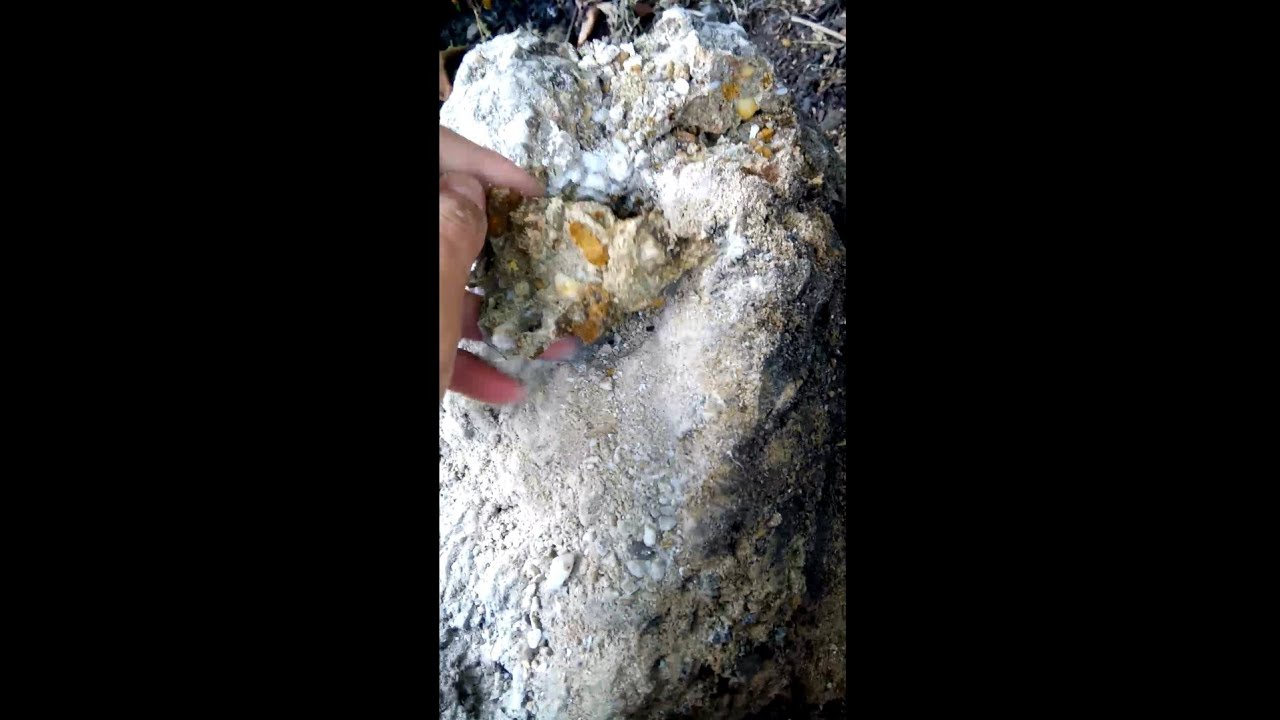 Volcanic Rock with some precious stones - YouTube