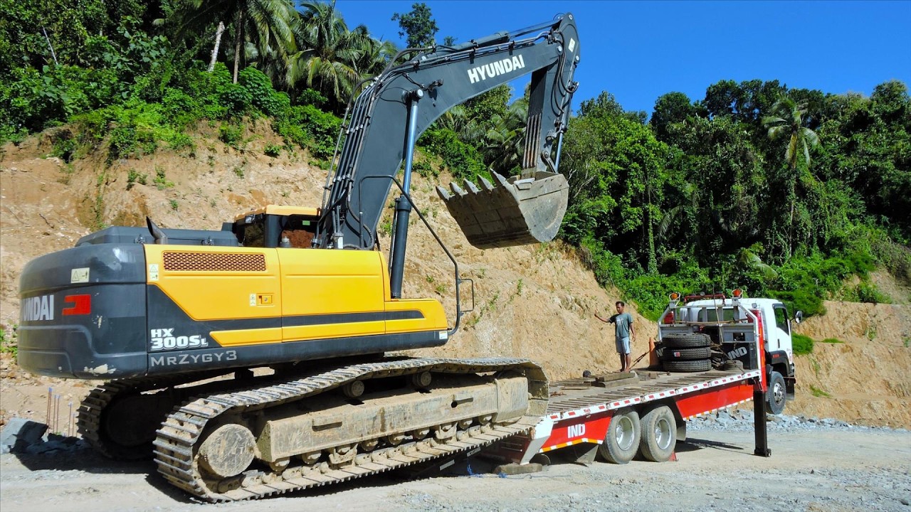 Self Loader Truck Loading Transporting Excavator Out From The Road ...