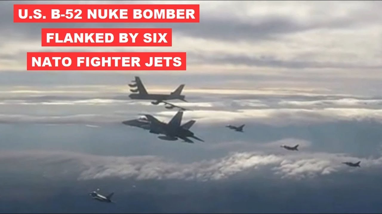 US B-52 nuke bomber is flanked by six Nato fighter jets in V formation - YouTube
