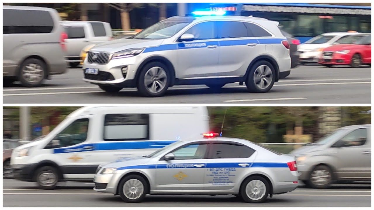 Police cruisers responding with siren - YouTube
