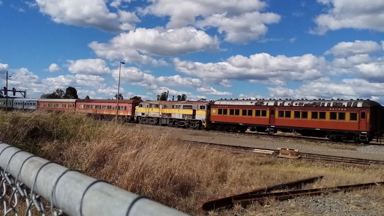 SHORT VIDEO: 4472 at Telarah yards with old ruined carriages - YouTube