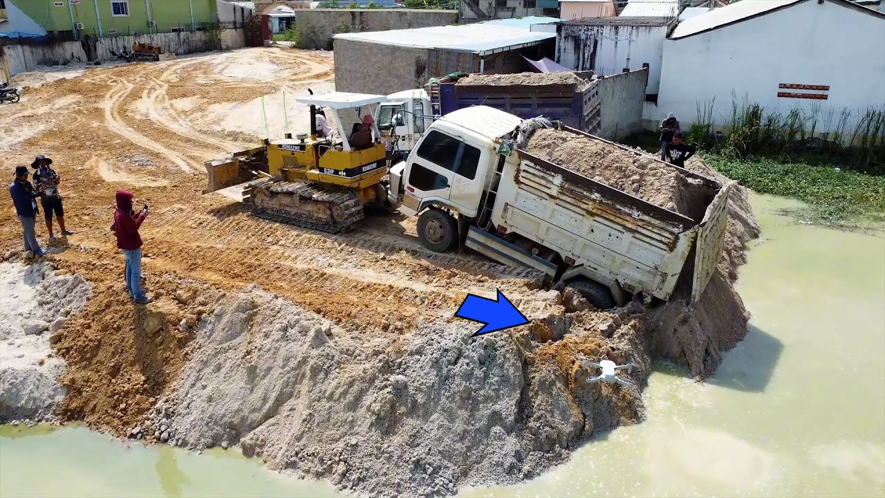 Dangerous Landfill Task! Overload Dump Truck Sinks into Water, Rescued ...