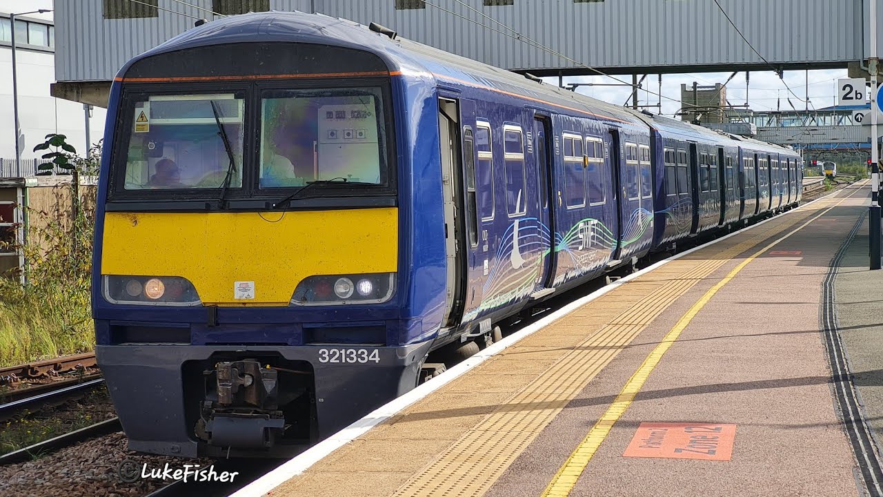 Swift Express Freight 321 334 leaving Peterborough Railway Station ...