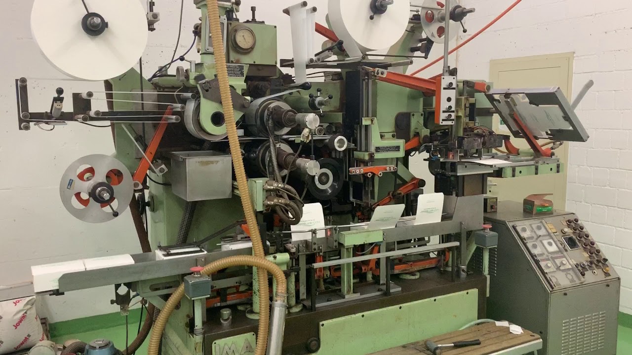 IMA C50 tea pot bag making machine with kartoner and overwrapper - YouTube