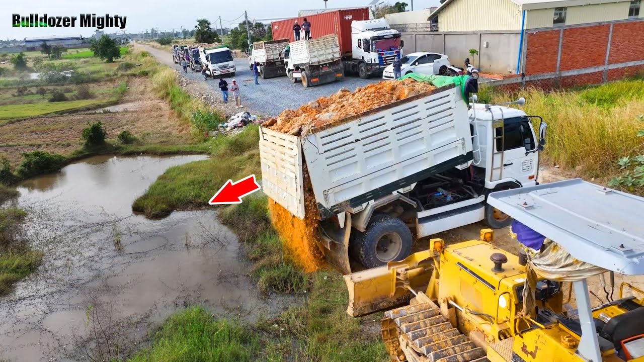 The first Dump Truck, Processing Filling Up The Land huge, Bulldozer ...