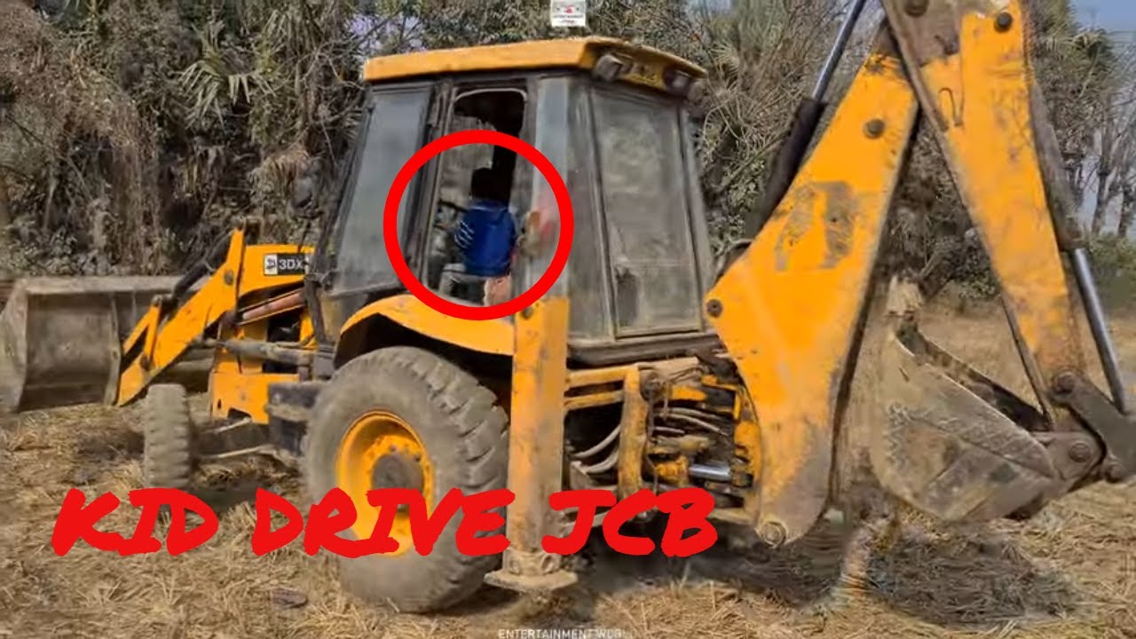 Indian Kid Driving Jcb - Little Indian Boy Driving Jcb Backhoe Loader ...