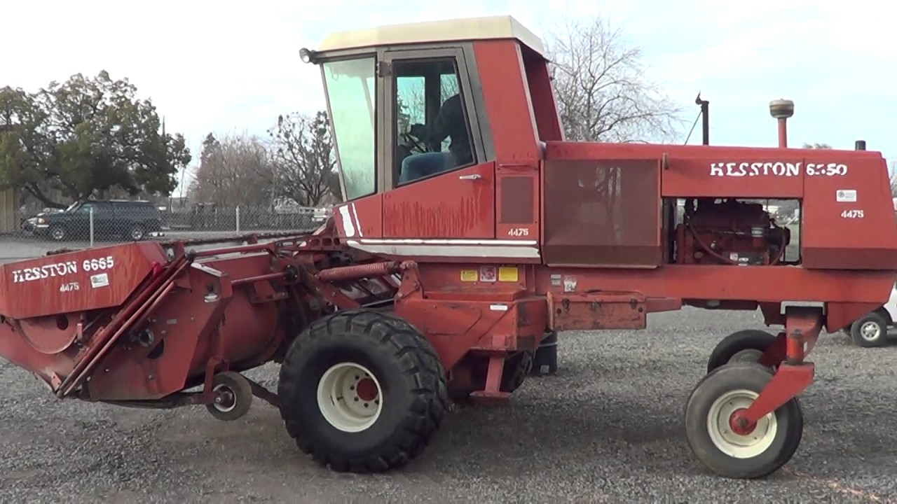 2017 January Public Auction: Lot 801: Hesston 6550 Swather - YouTube