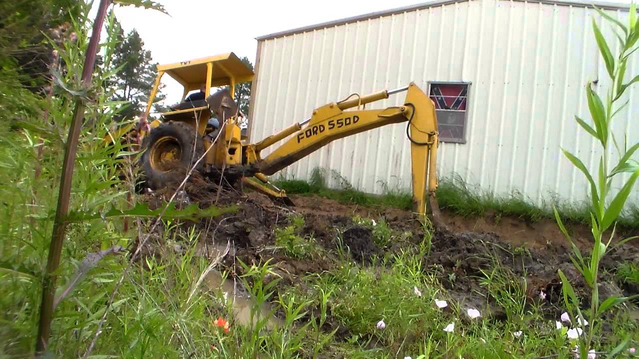Backhoe Stuck like Chuck - YouTube