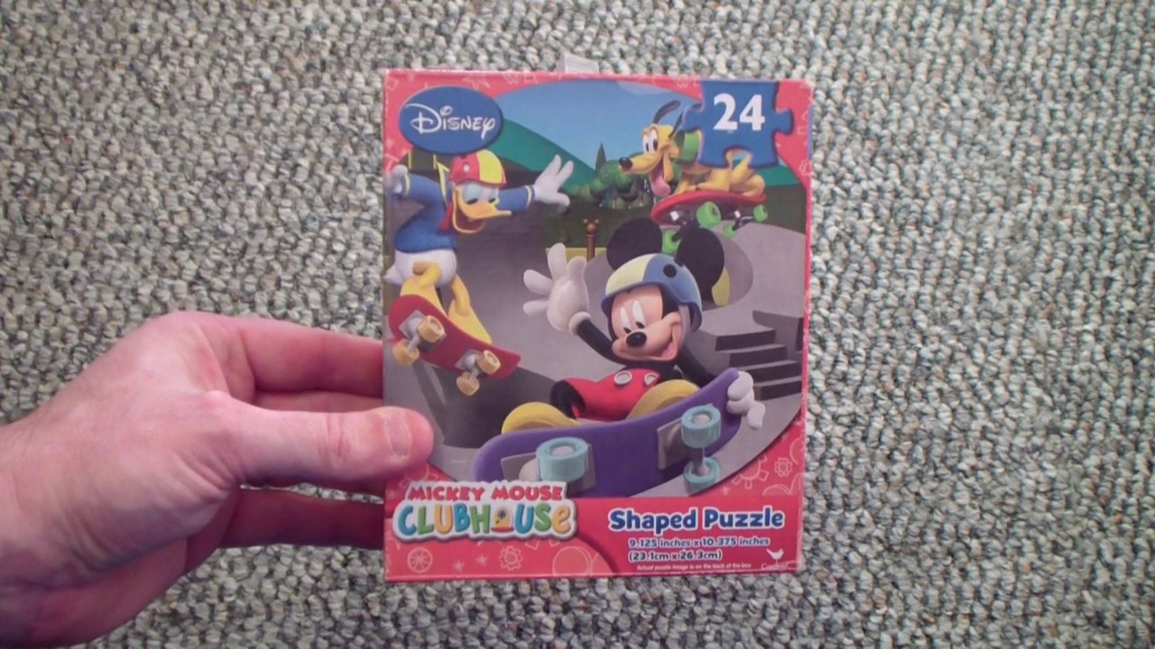 Putting the Mickey Mouse Clubhouse 24 piece shaped puzzle together ...