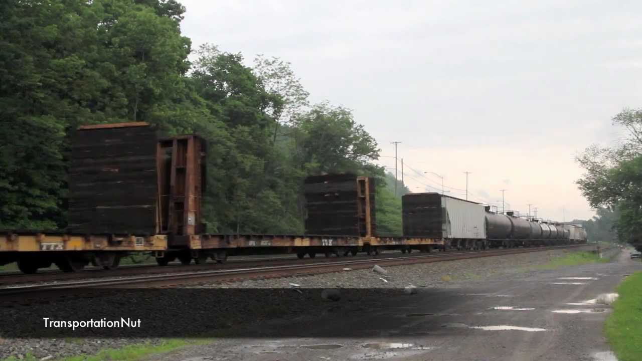 Conrail Quality SD60I powers mixed freight - YouTube