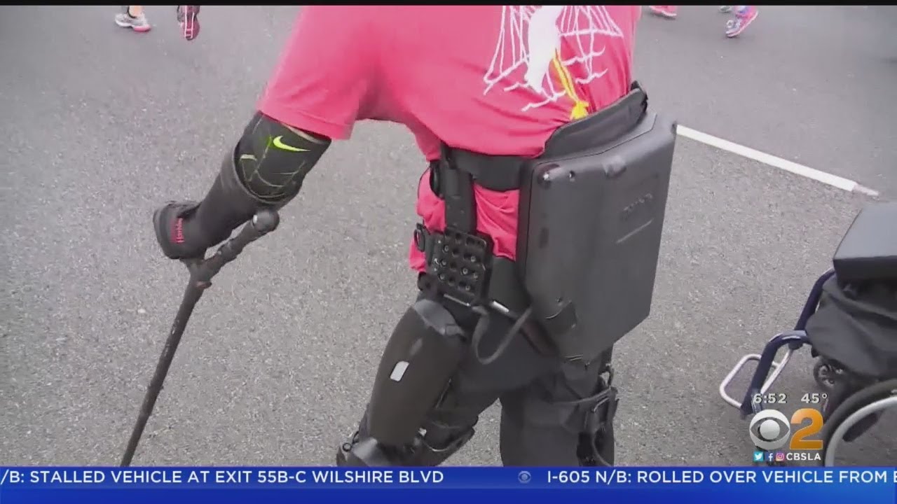 Paralyzed Athlete Will Take On LA Marathon In Robotic Exoskeleton - YouTube
