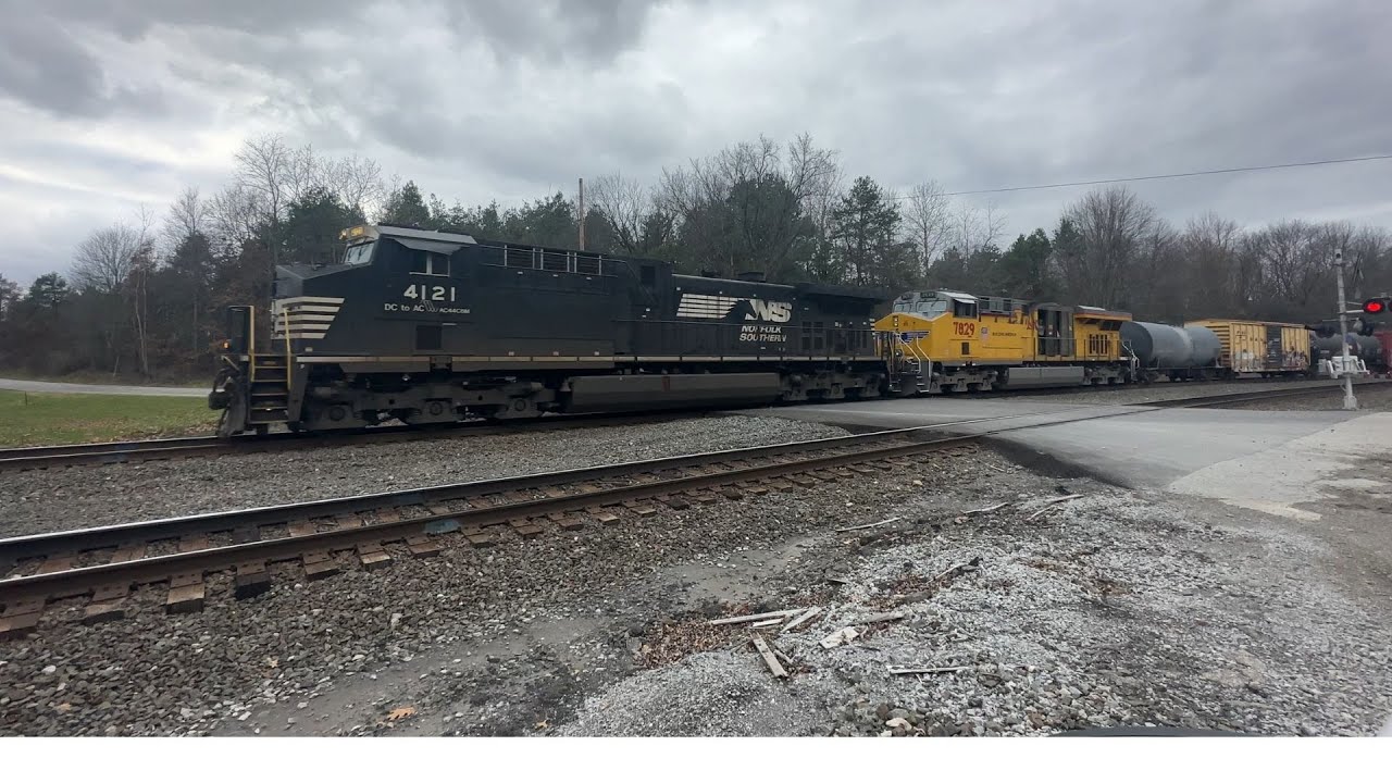 This Awesome Train Pulling Tractors and Rolls of Metal is Stunning ...