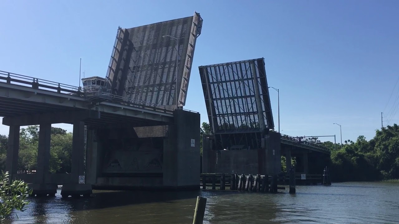 Draw bridge opening and dolphins caught on tape while fishing! - YouTube