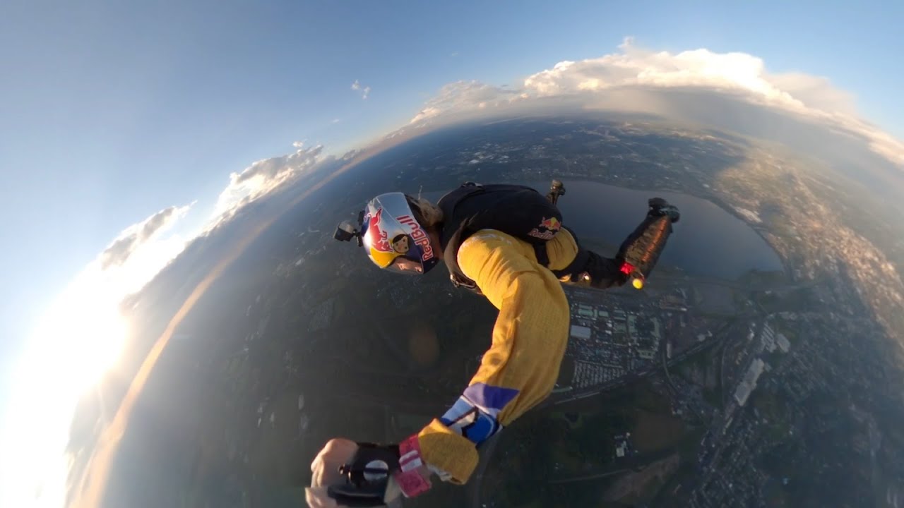 Skydivers jump out of plane above Syracuse, land at NY State Fair - YouTube