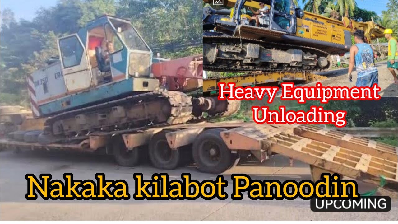 Heavy Equipment Drilling & Crane Unloading - YouTube