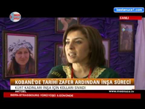 Kürt Kadını Kobani'yi inşa için Kolları sıvadı.
