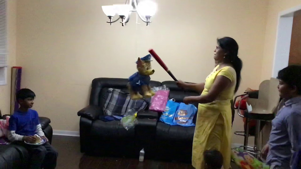 Hitting the piñata using a bat - YouTube