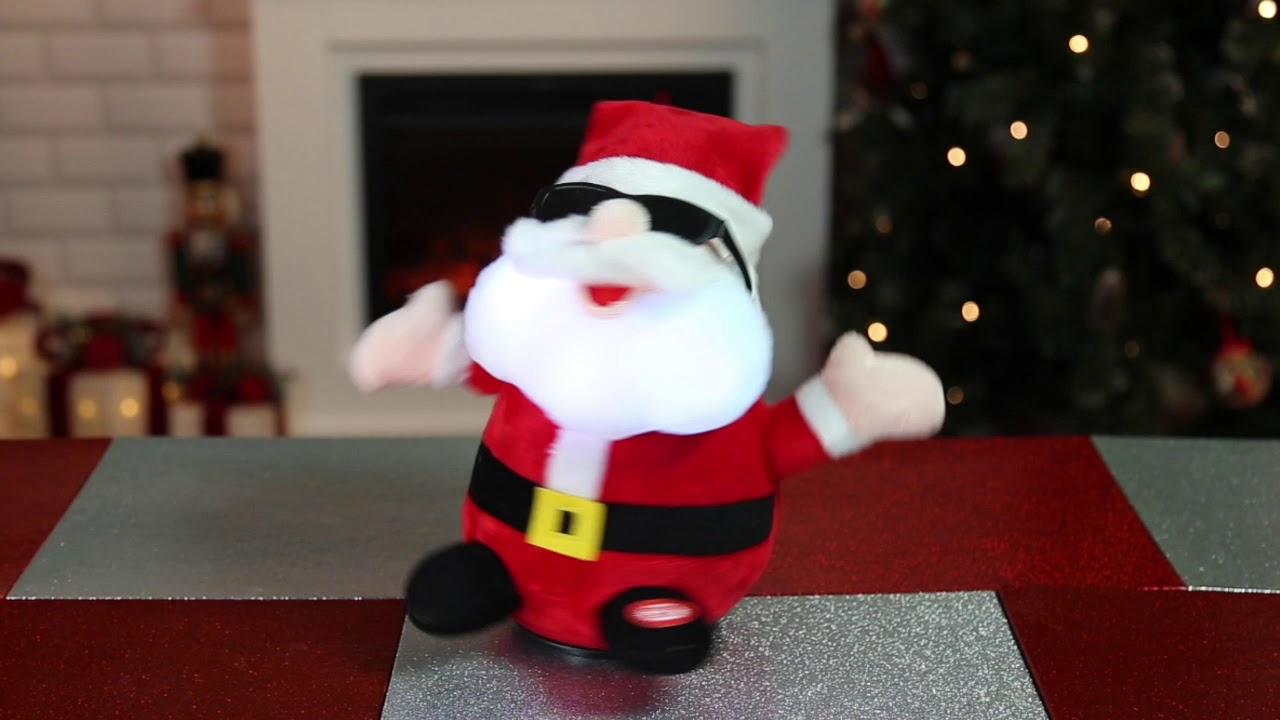 The Christmas Workshop Spinning Santa Christmas Toy - YouTube