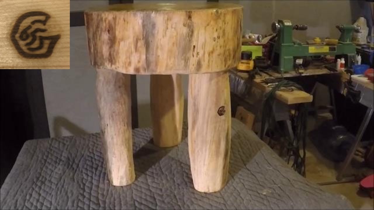 G65 chainsaw carved fire side stool - YouTube