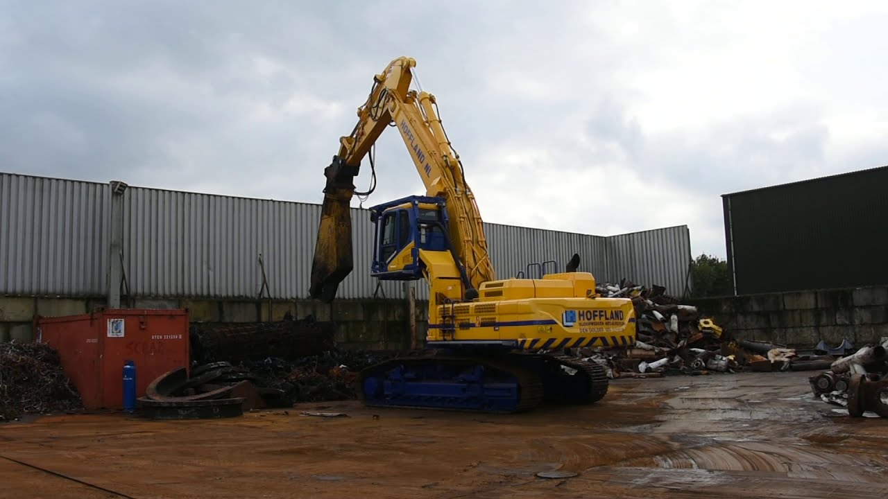 Etec 855-5 demolition excavator with Genesis GXP 660R scrap shear ...