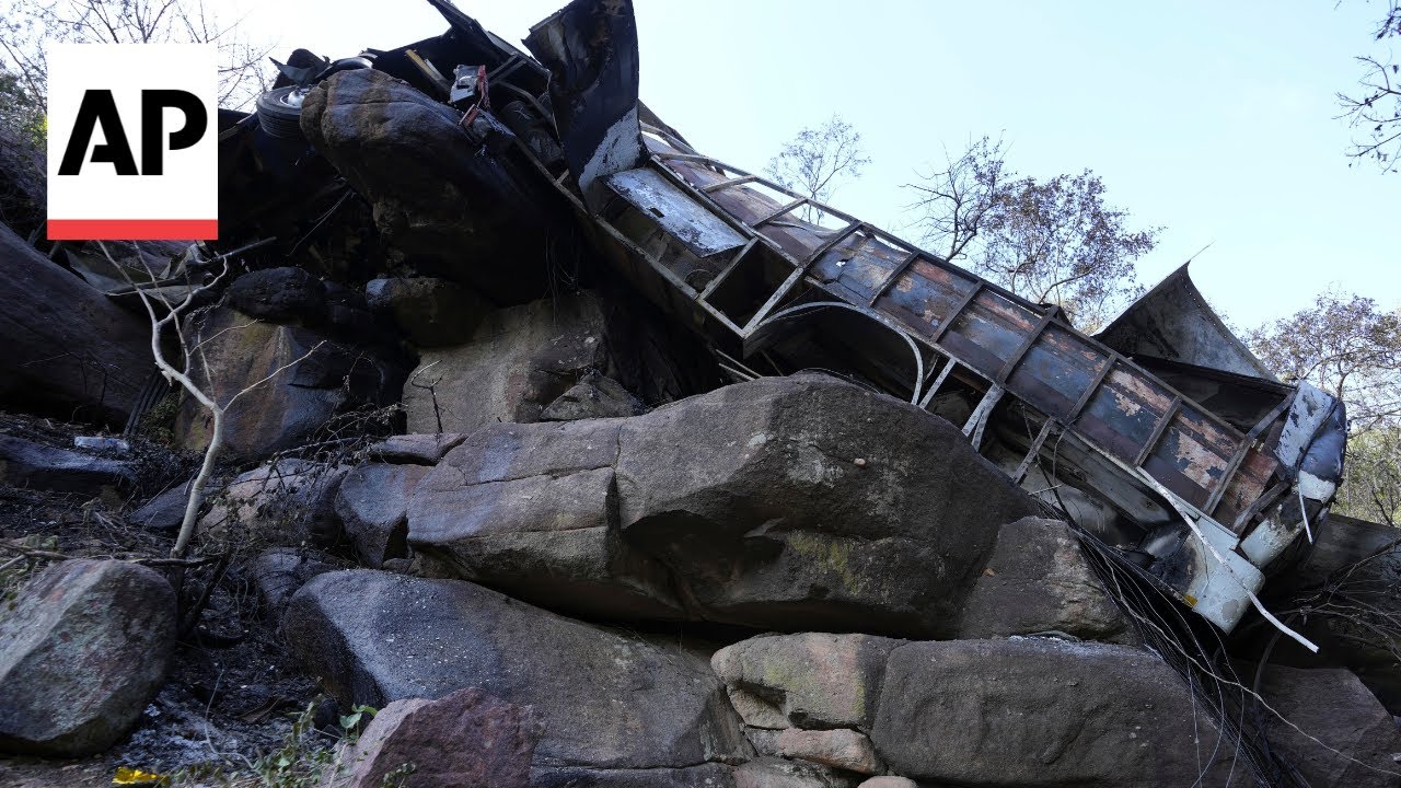 Investigators comb scene of deadly South Africa bus crash - YouTube