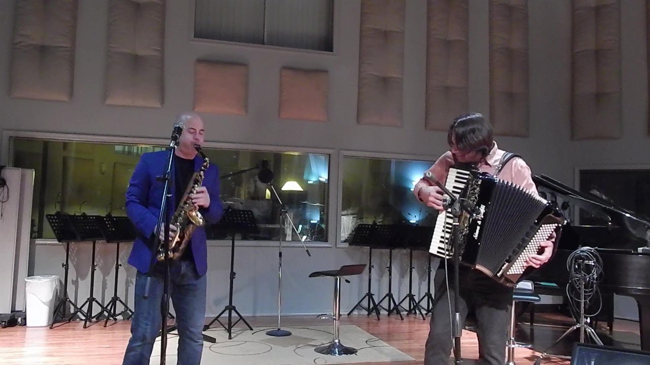 Fly Me to the Moon featuring Erich Cawalla (Sax and Vocals) and Alex ...