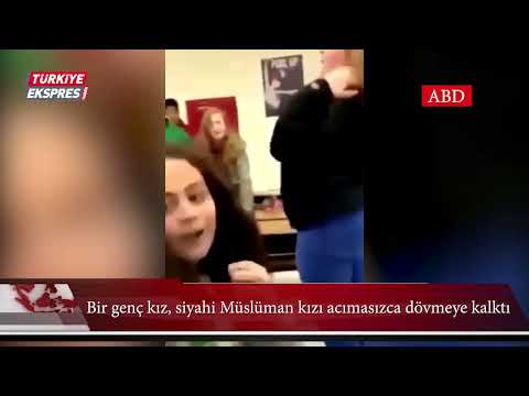 Bir genç kız, siyahi Müslüman kızı acımasızca dövmeye kalktı