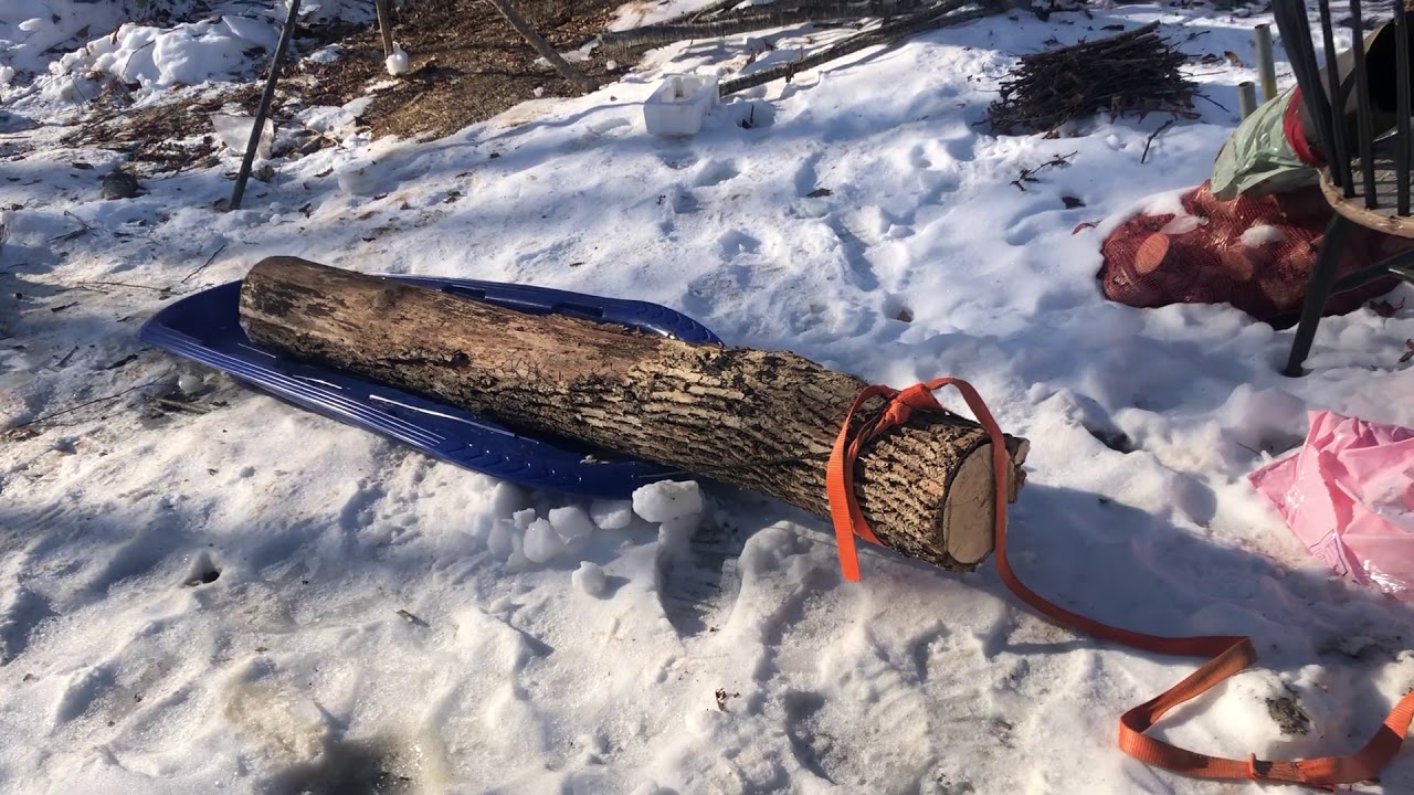 Hauling logs with new sled - YouTube